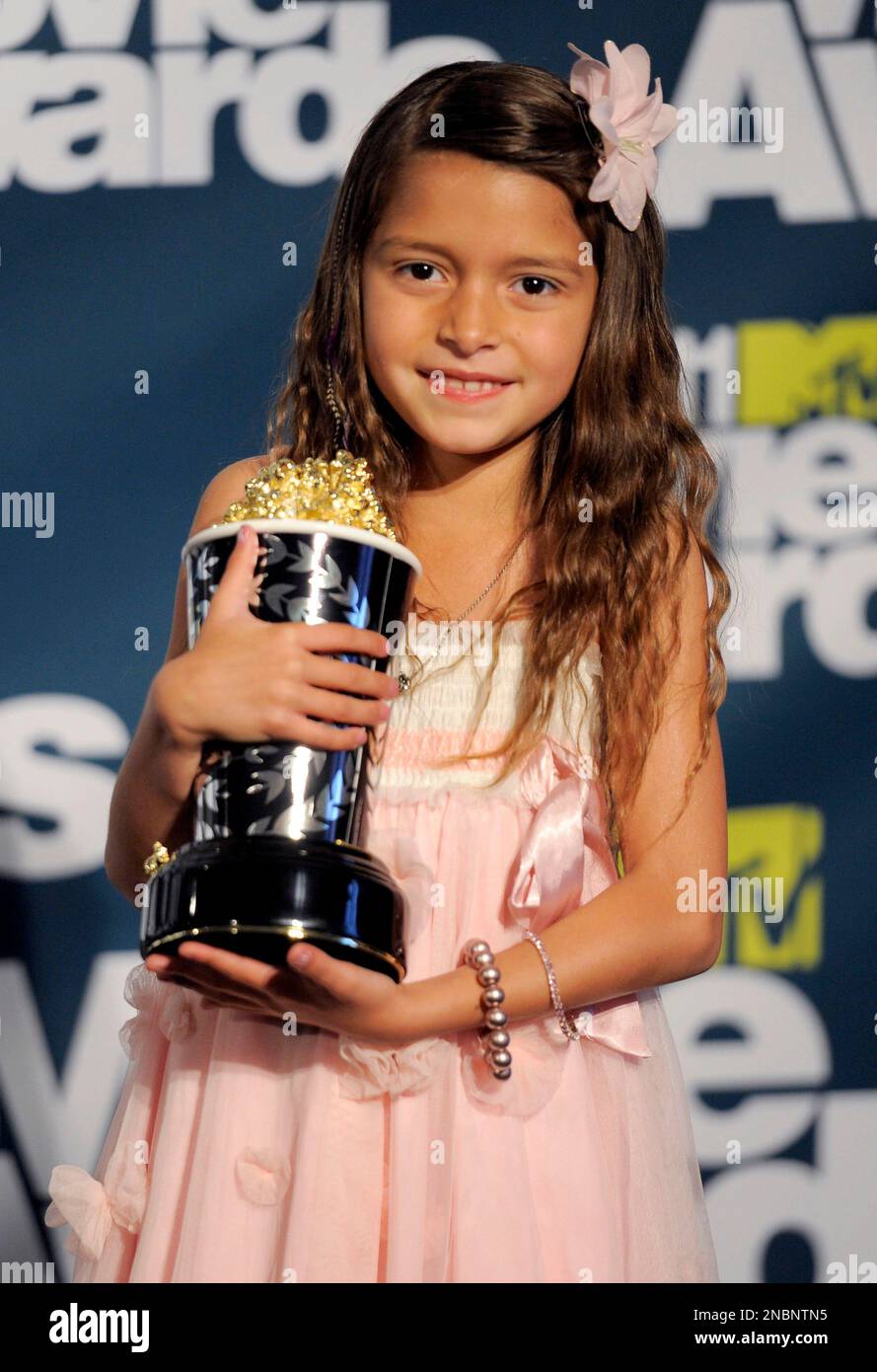 Alexys Nycole Sanchez poses backstage with her award for best line in a ...