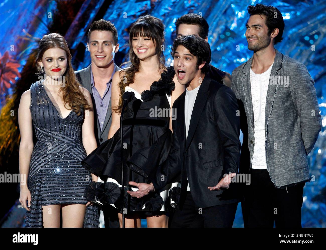 Tyler Posey, front center, and fellow cast members from the TV show ...