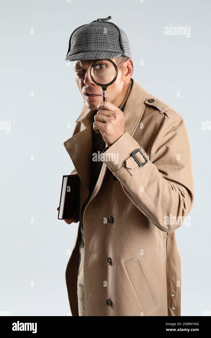 Retro private eye detective searching hi-res stock photography and ...