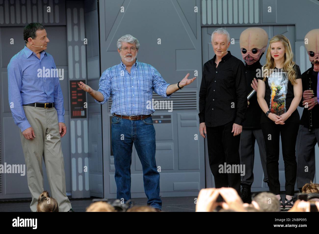 Disney CEO Robert Iger, left, Star Wars creator George Lucas, second ...