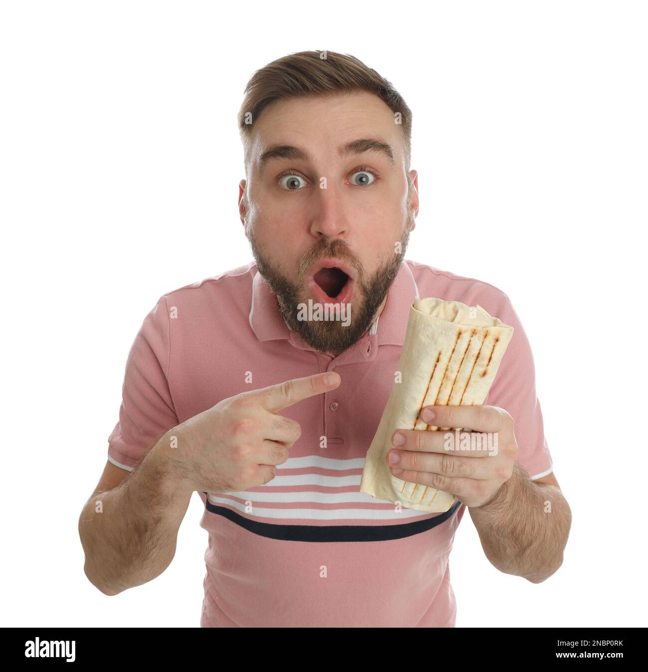Emotional young man with delicious shawarma on white background Stock ...