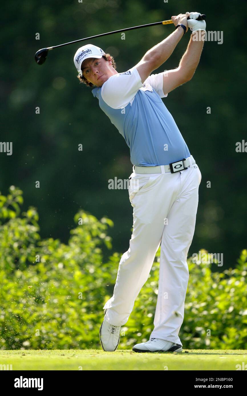 Rory McIlroy watches a tee shot during the third round of the Memorial ...