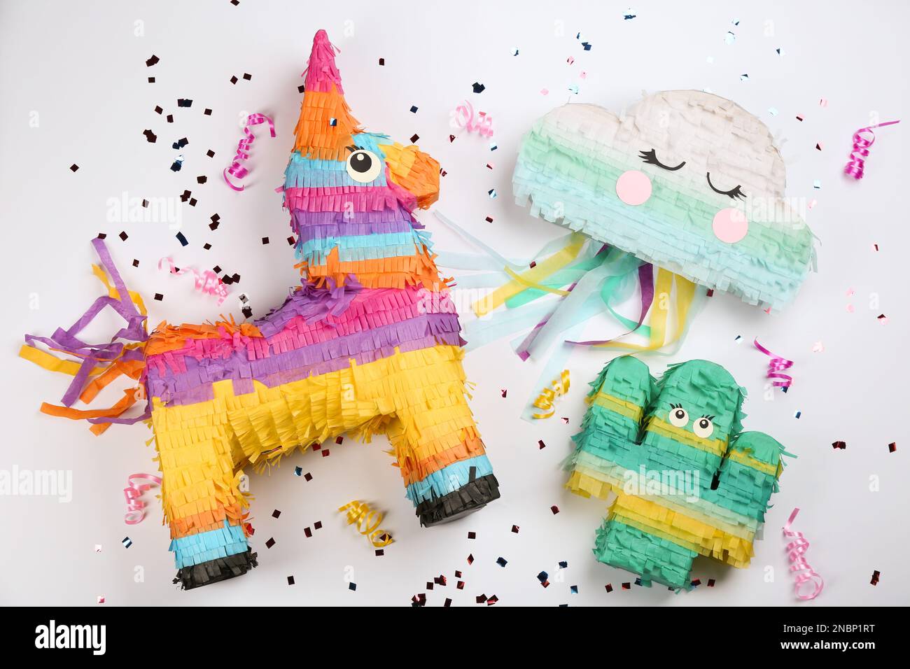 Different pinatas on white background, top view Stock Photo - Alamy