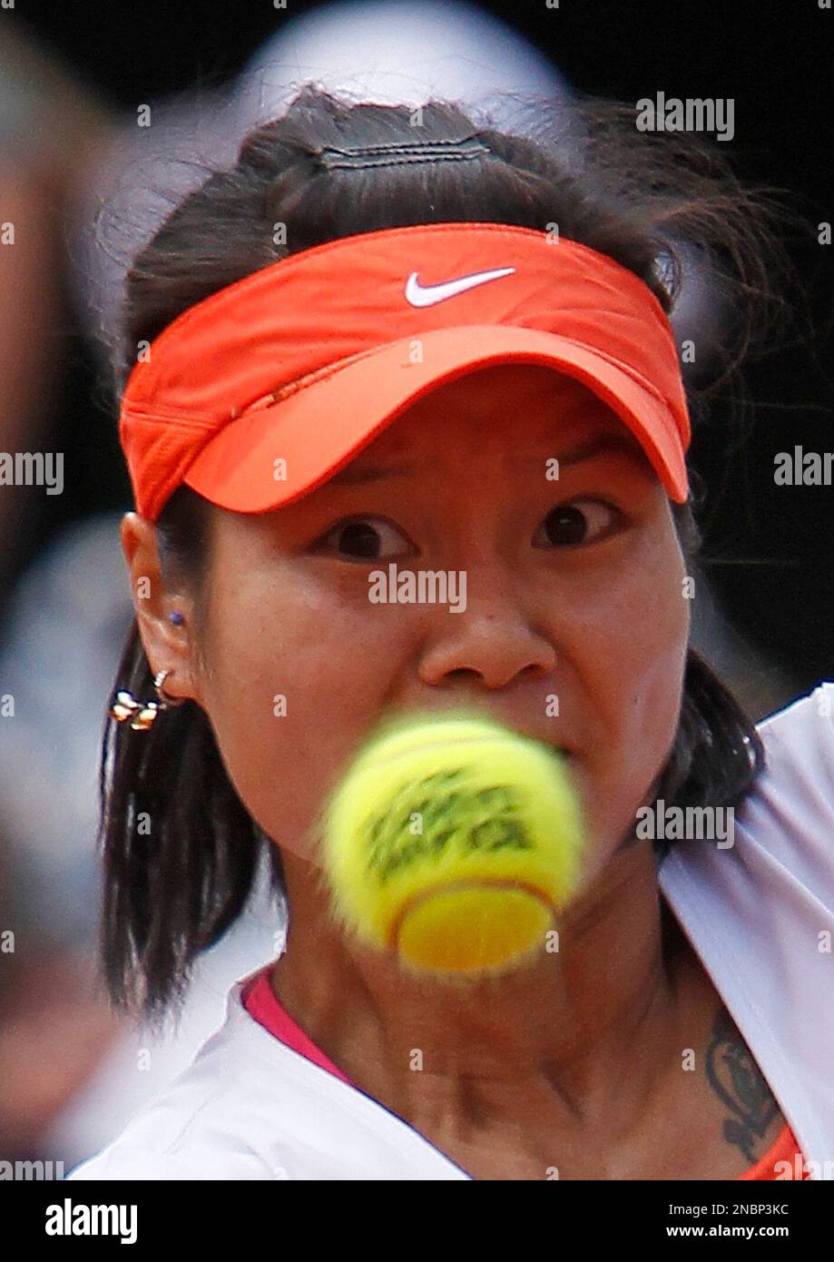 China's Li Na eyes as she plays Italy's Francesca Schiavone during ...