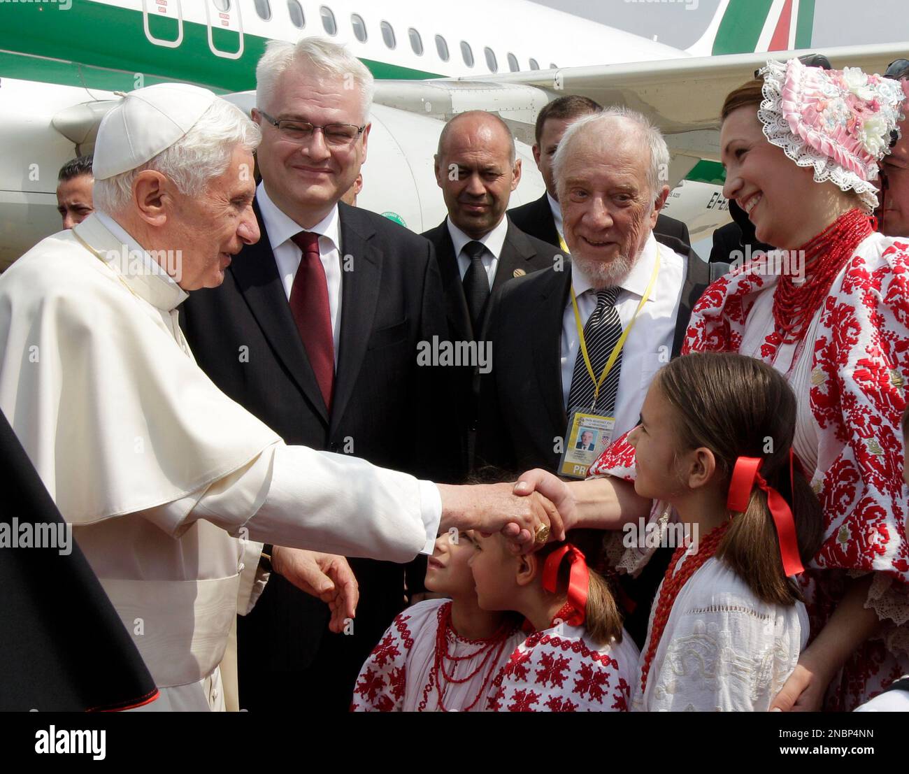 Pope Benedict XVI, left, standing beside Croatian president Ivo ...