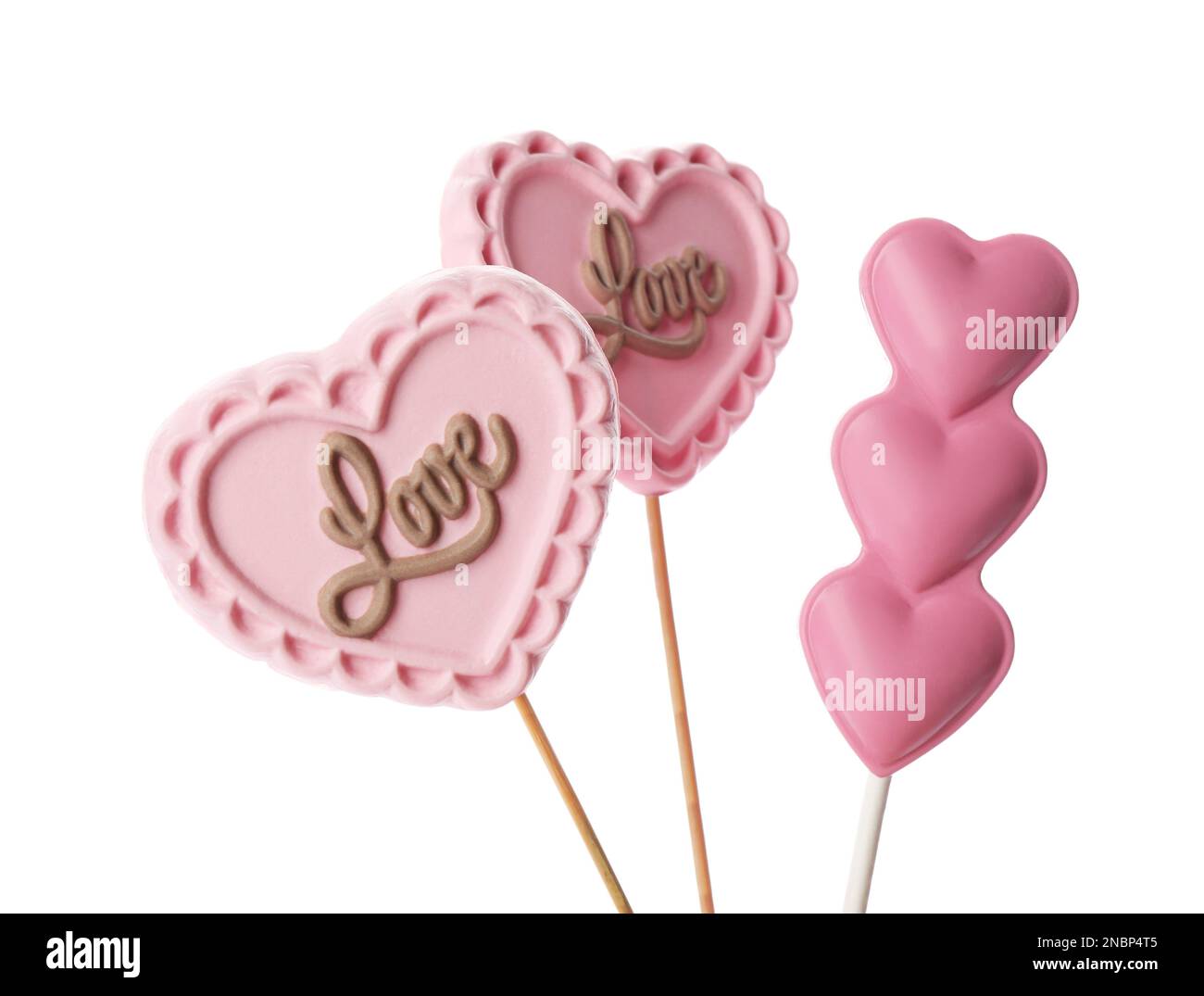 Heart shaped lollipops made of chocolate on white background Stock ...
