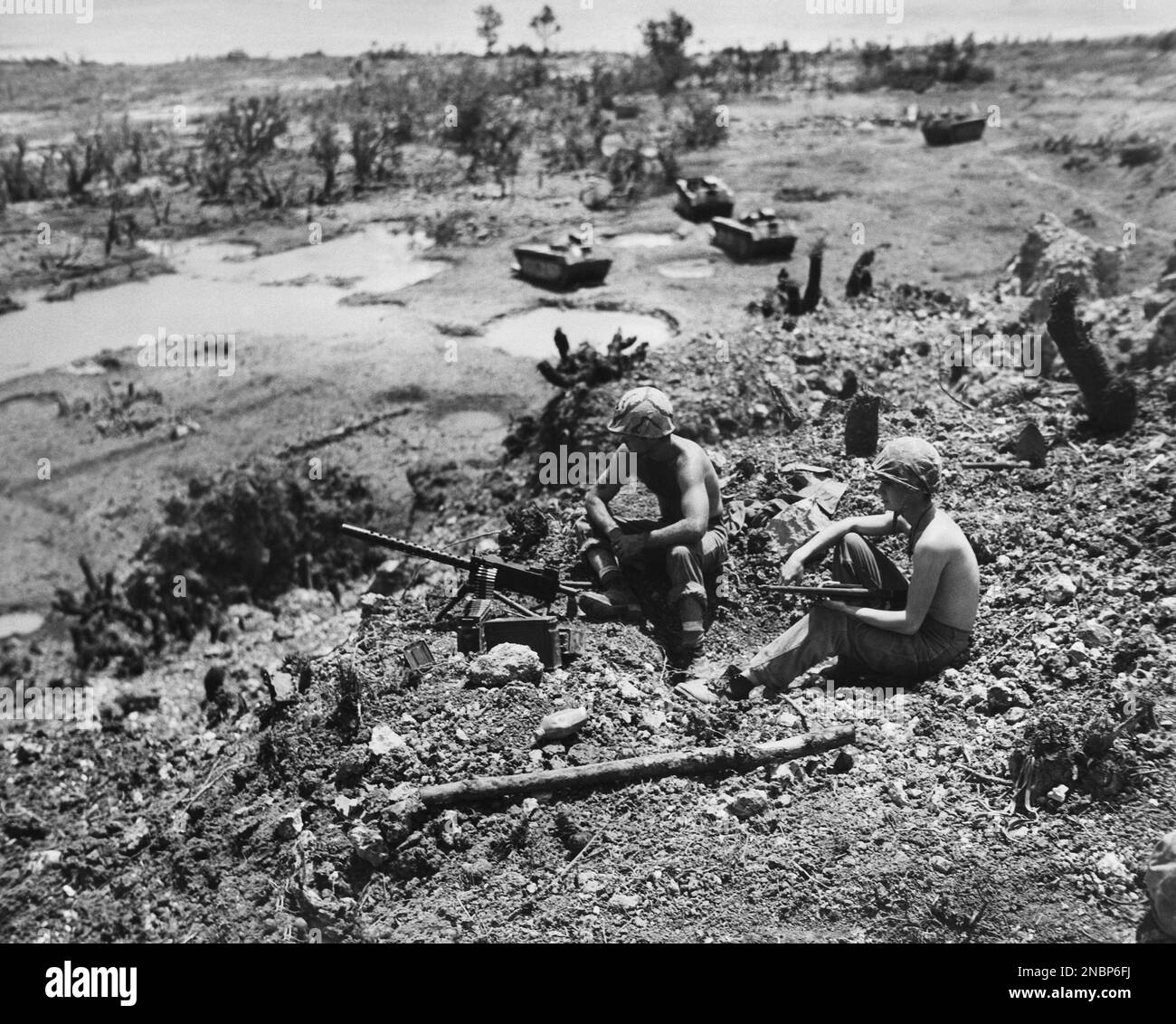 If stray Japanese soldiers should come along on Okinawa, these marines ...