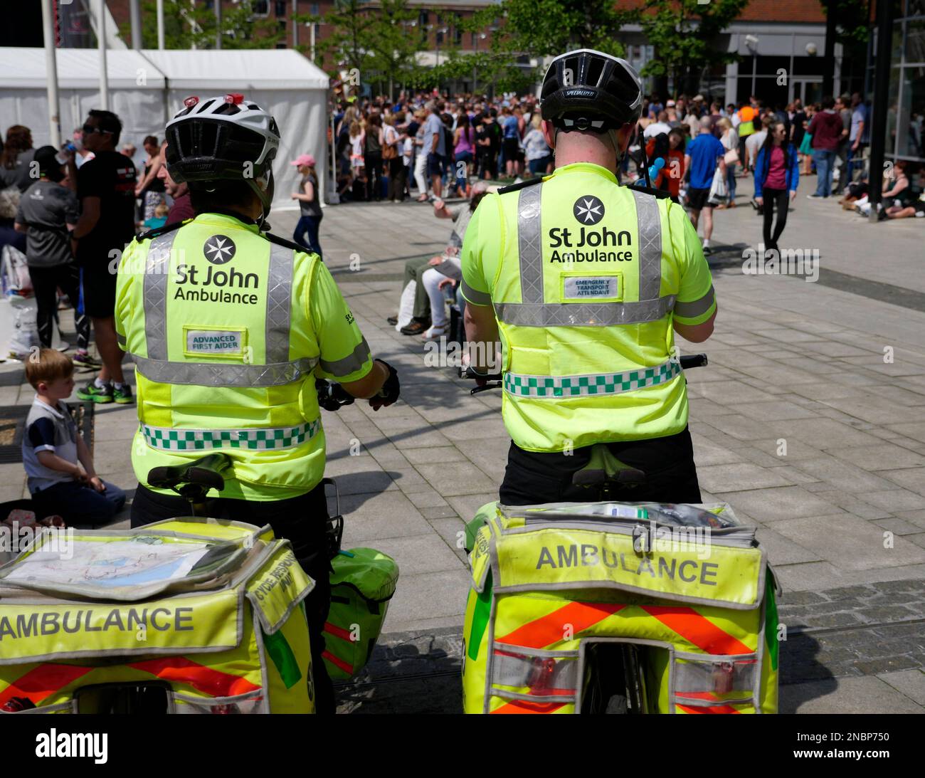 Working outside in the City. Liverpool UK. St Johns Ambulance on bikes ...