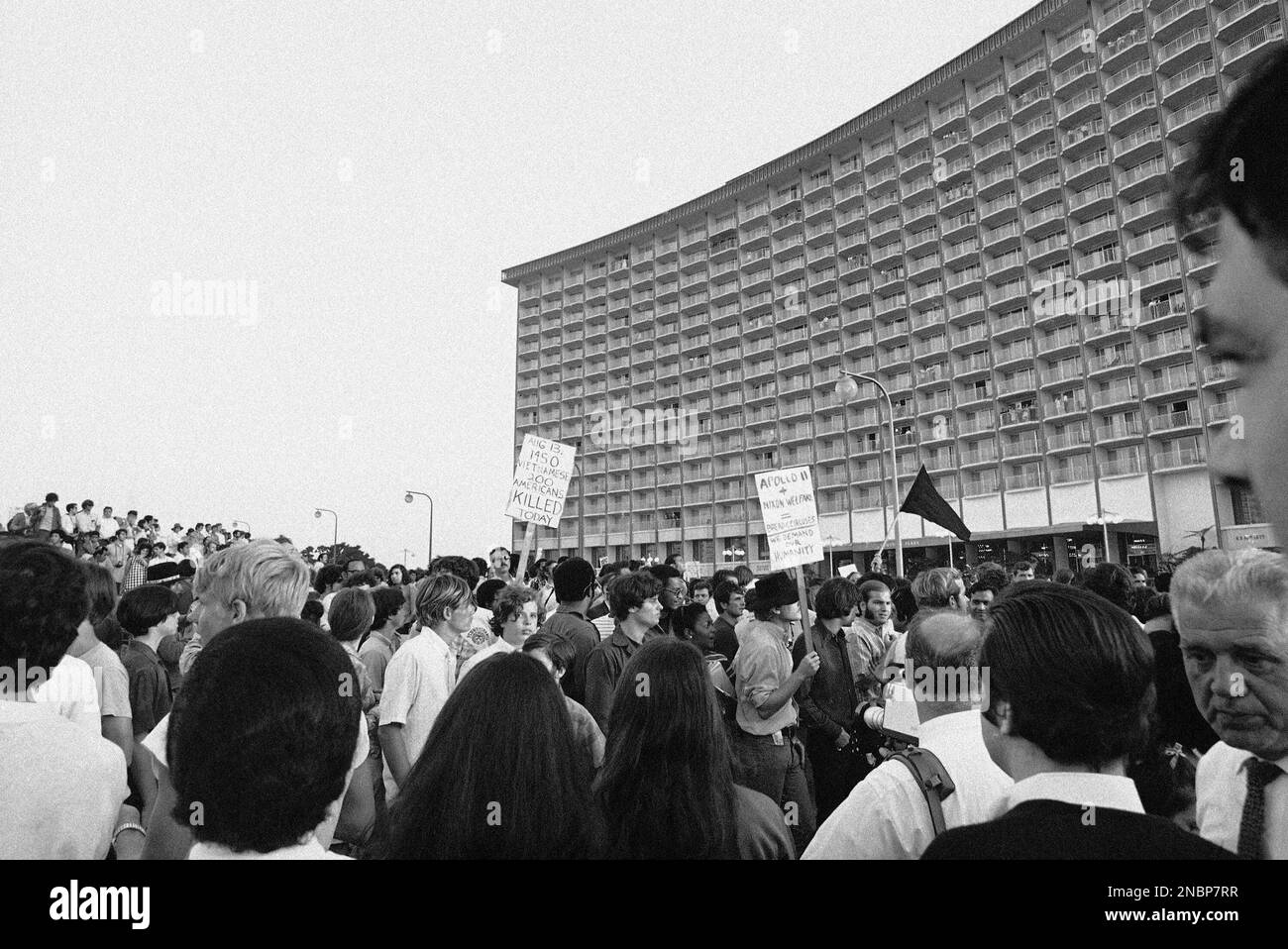 Anti-war pickets march outside the Century Plaza Hotel in Los Angeles ...