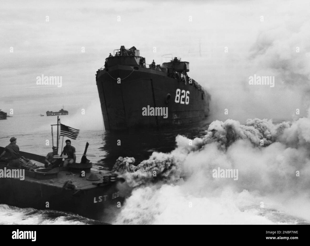 On the approach of Japanese planes over Okinawa, LCVPs, equipped with ...