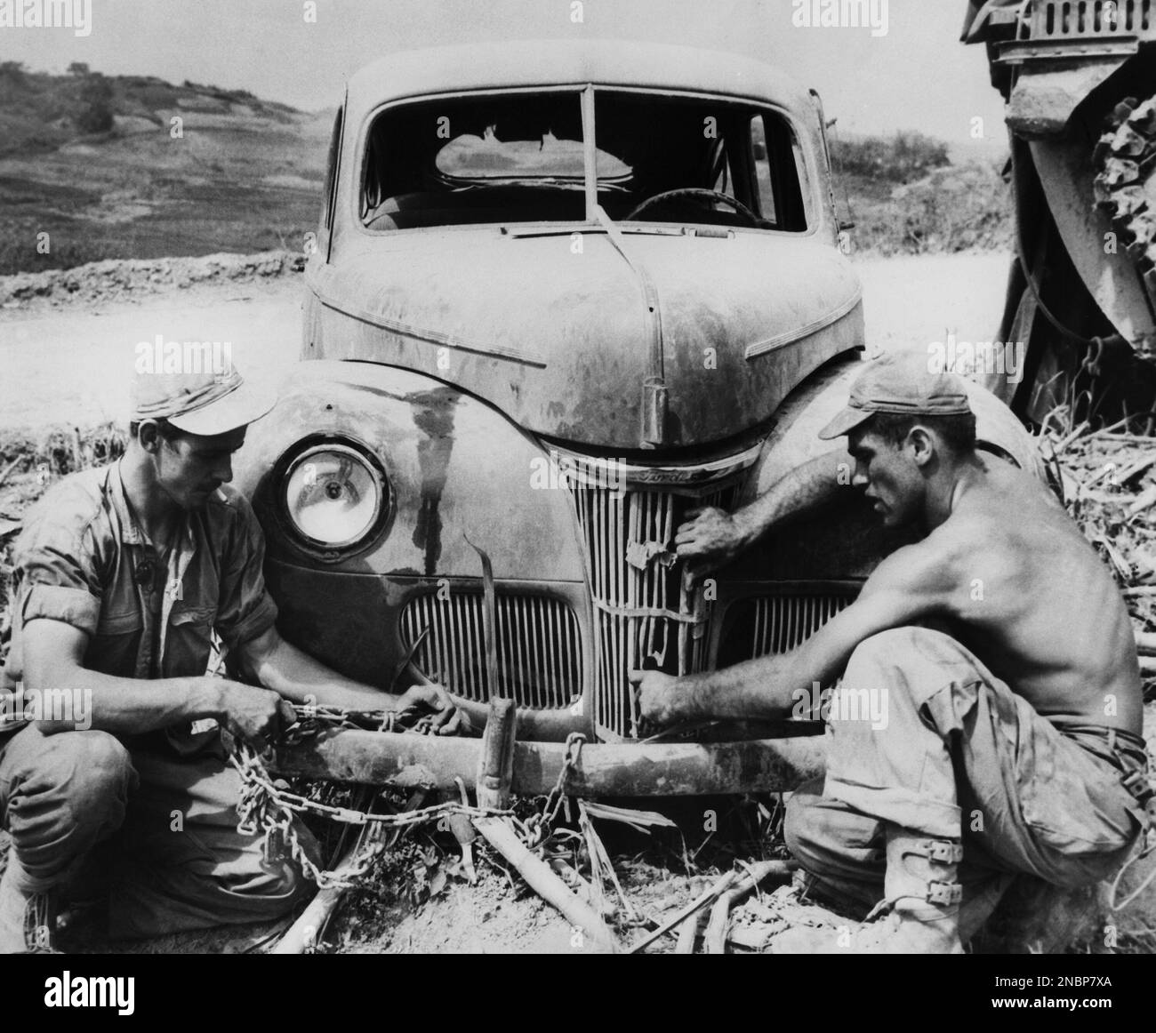 Marine jeep driver, Pfc. Louis H. Gagnon, South Boston, Mass., and Pfc ...