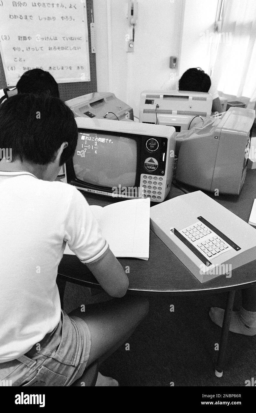 Student using pencil and pad struggles to solve his headache before ...