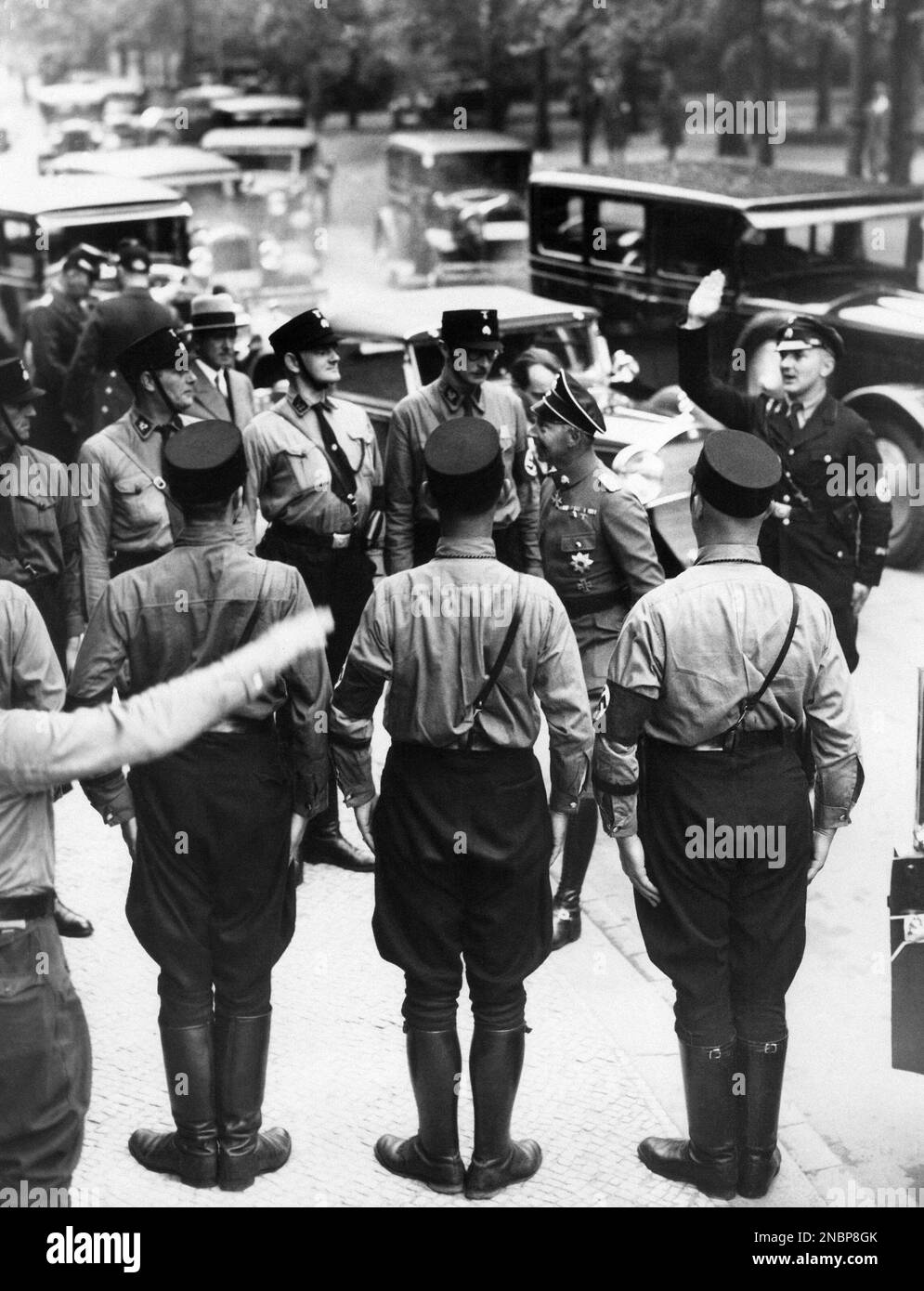 A Nazi guard stands at attention as the former Crown Prince enters the ...