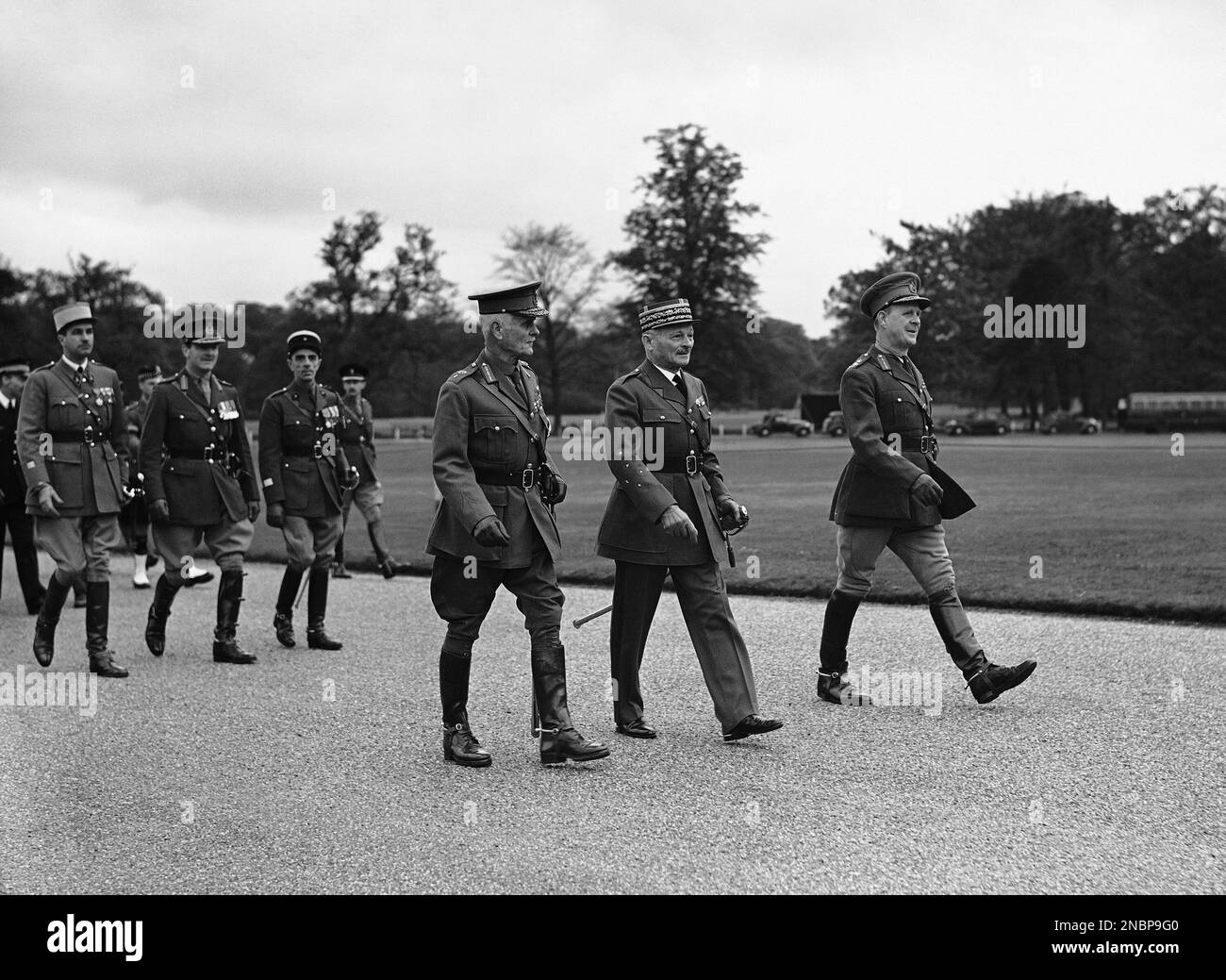 Walking looking away authority uniform hi-res stock photography and ...