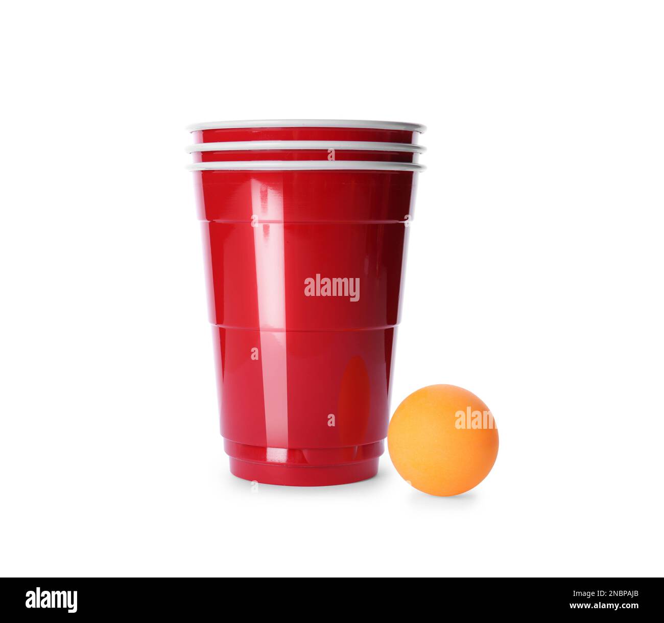Red plastic cups and ball for beer pong on white background Stock Photo ...