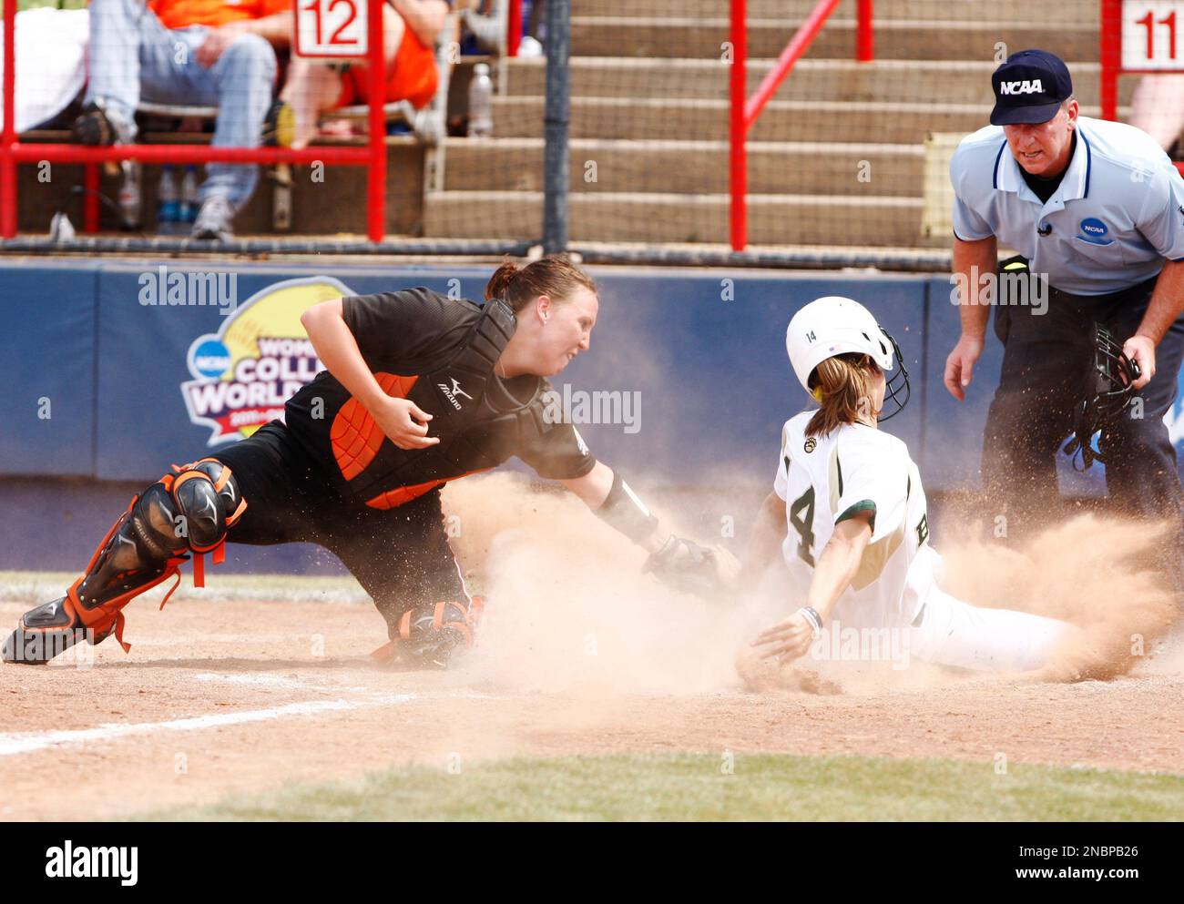 Oklahoma State catcher Ashley Boyd, left, tags out Baylor's Makenzie ...