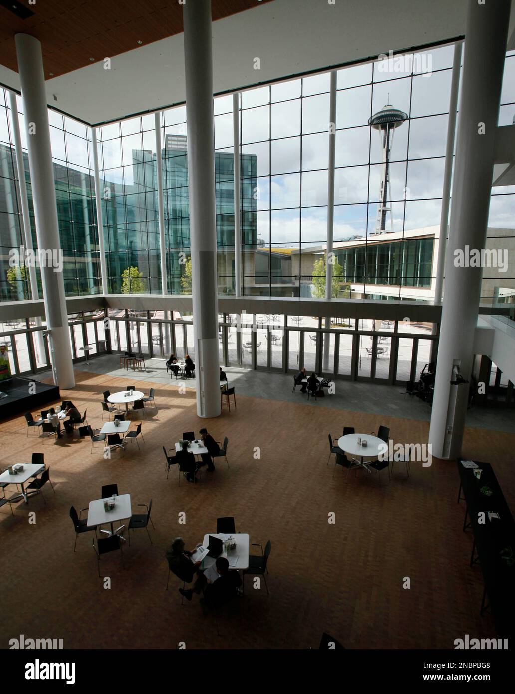 Windows in a multi-story atrium look over the courtyard of the new Bill ...