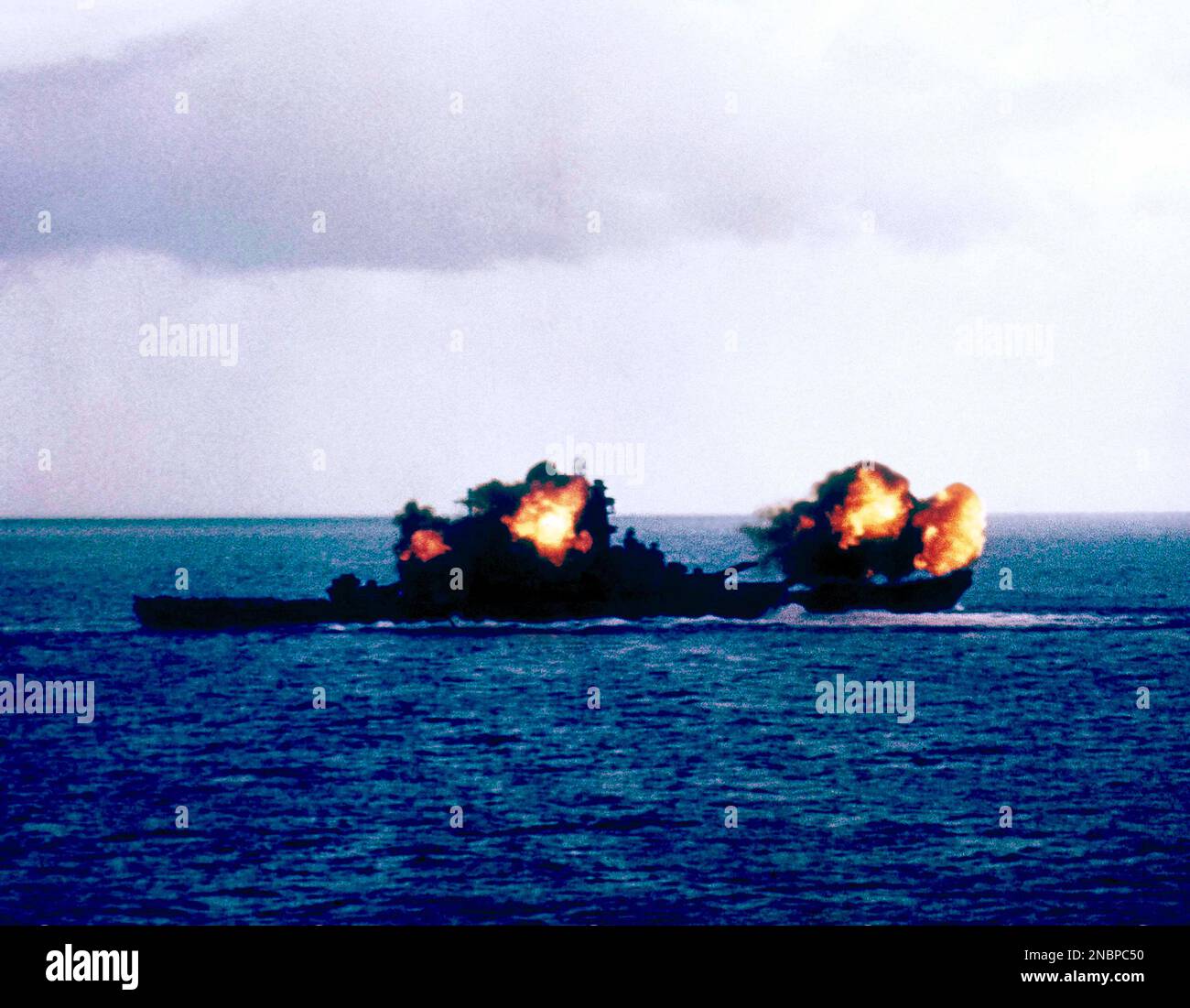 U.S. battleships attack Japanese forces on Saipan and Tinian Islands in ...