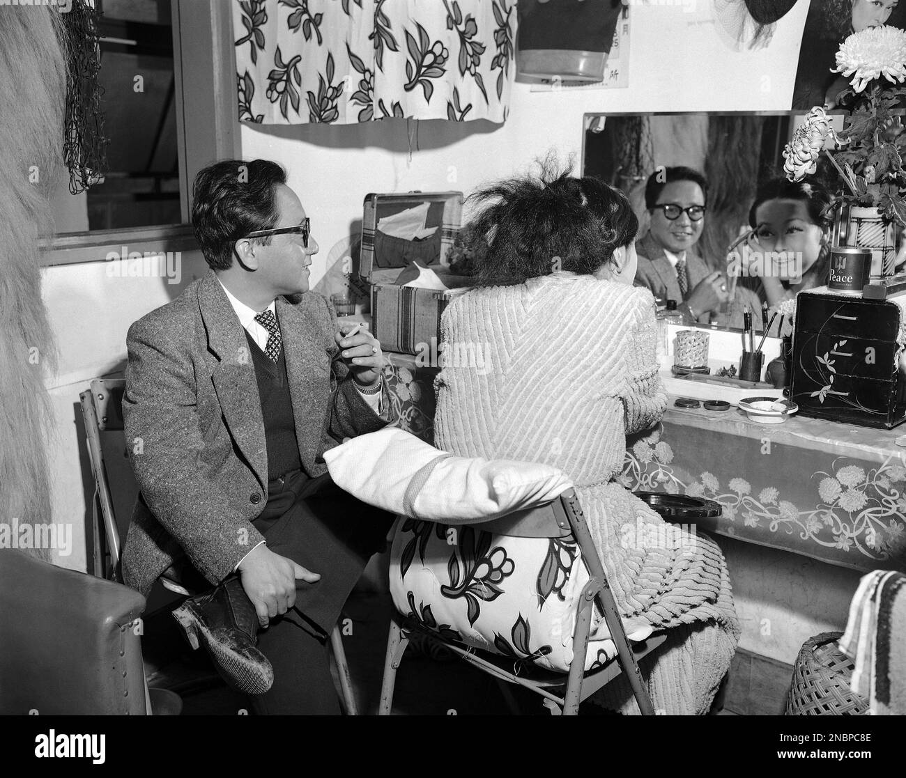 Choken Maruo, left, Manager of the Nichigeki Music Hall chats with star ...