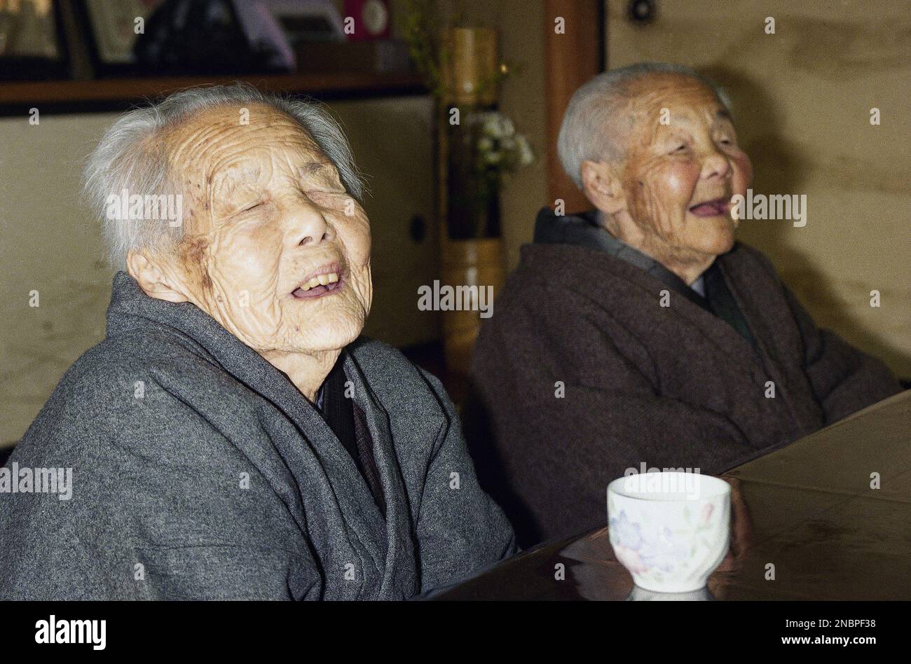 Gin Kanie, left, and Kin Narita, tiny, silver-headed identical twin ...