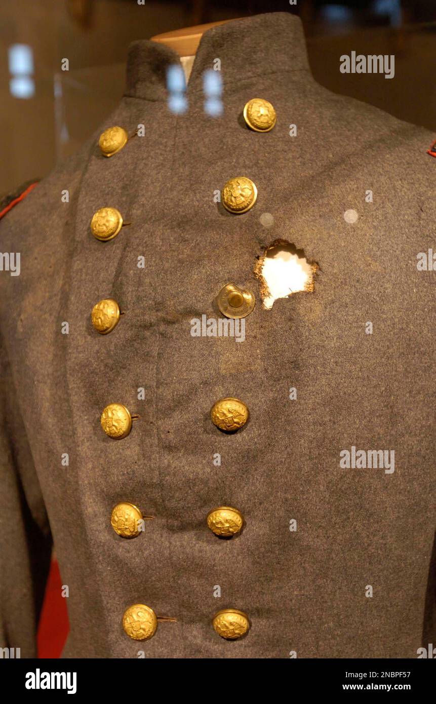 FILE- This Thursday, Nov. 18, 2004 file photo shows a bullet hole in ...