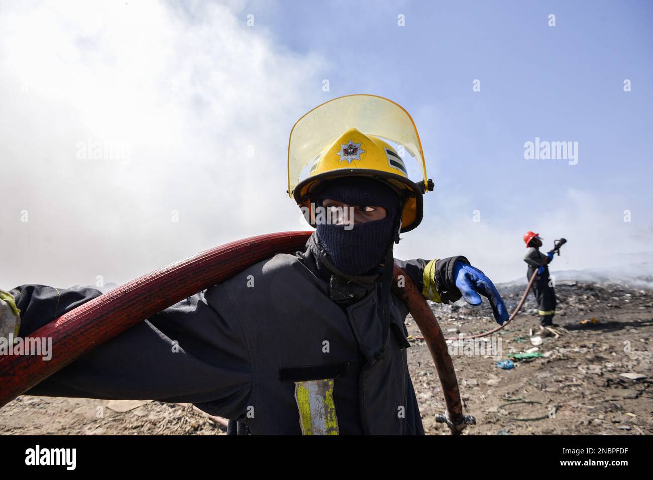 Nakuru, Kenya. 13th Feb, 2023. Firefighters attempt to extinguish fire ...