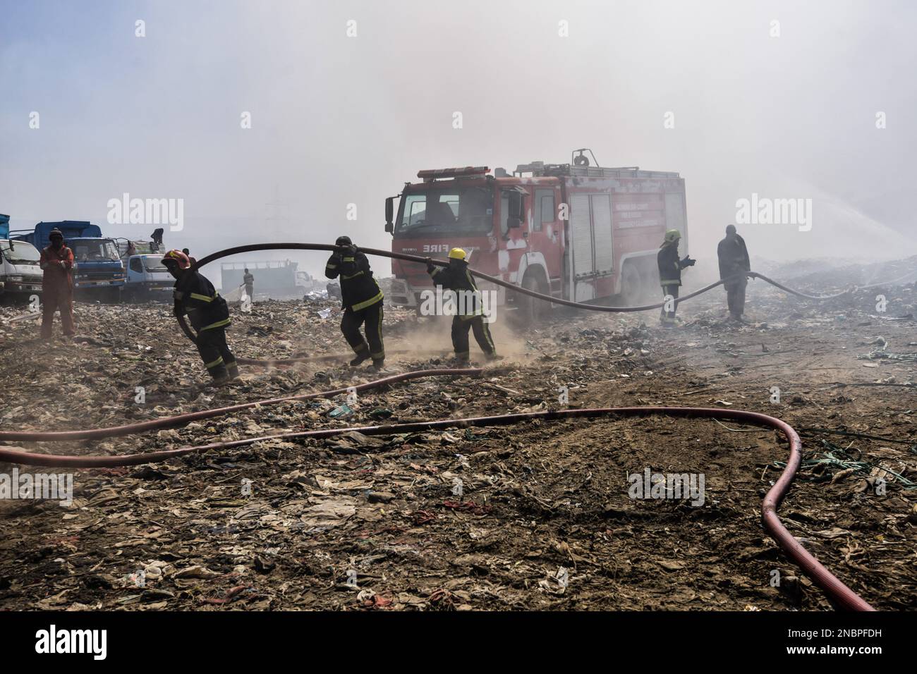 Nakuru, Kenya. 13th Feb, 2023. Firefighters attempt to extinguish fire ...