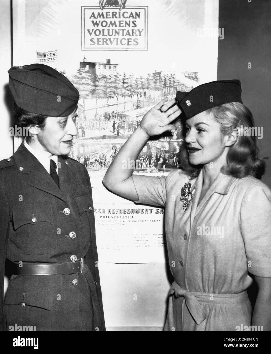 Mrs. Morton S. Stern (left) gets a salute from Claire Trevor after the ...