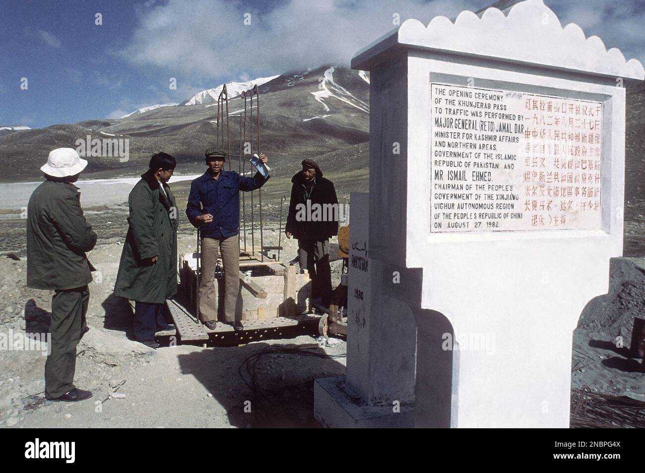 Chinese soldiers building a new standard to mark the the border at ...