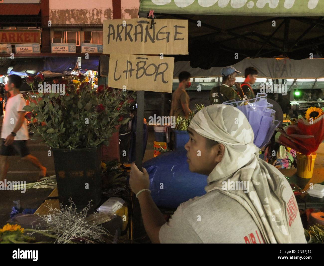 Manila, Philippines. 13th Feb, 2023. An arrange labor was written on ...