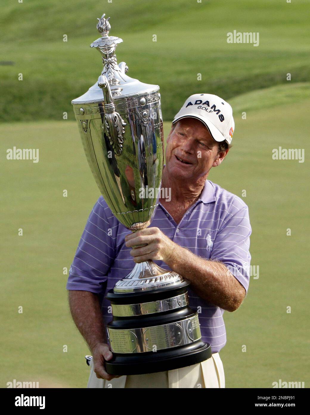 Tom Watson admires the Alfred S. Bourne trophy after beating David Eger ...