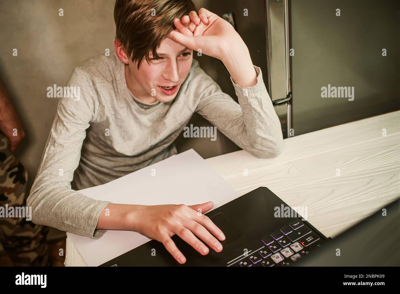Teen boy school work hi-res stock photography and images - Alamy