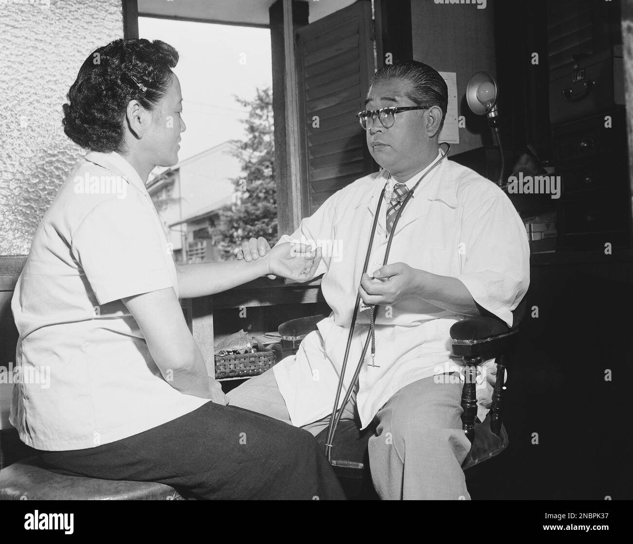 Dr. Hideo Hirota, shown Sept. 23, 1958, served in the Japanese army ...