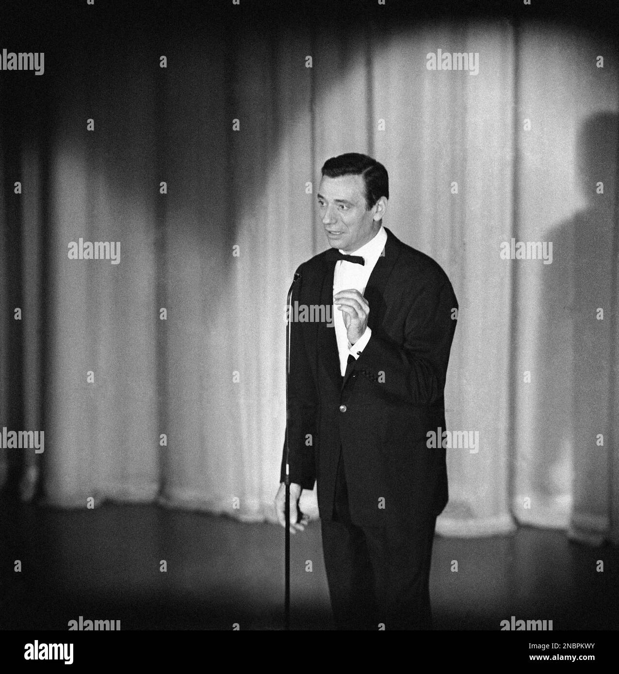French comedian Yves Montand performs on the stage of the Pantages ...