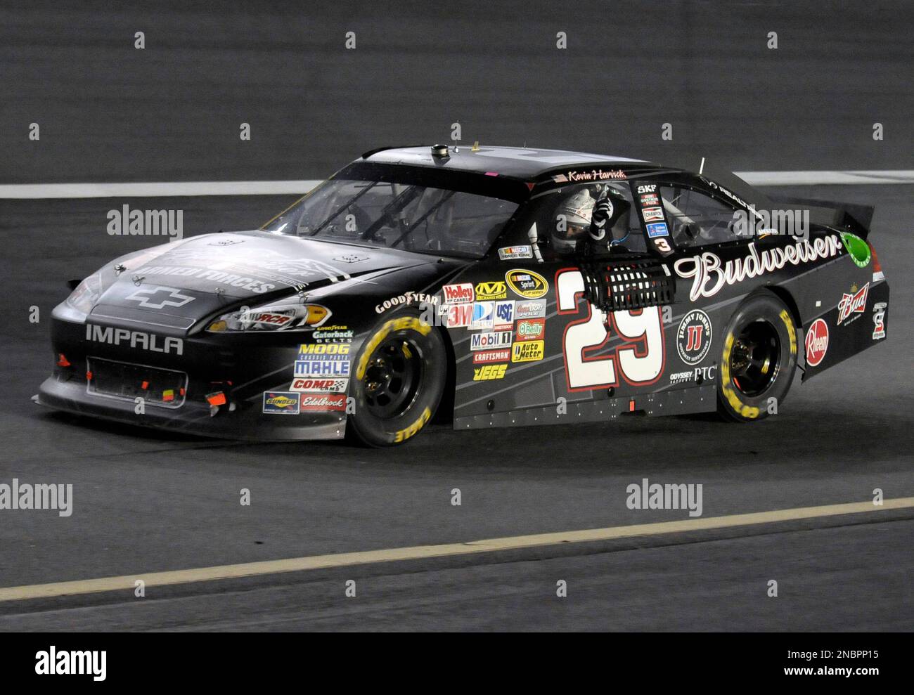 Kevin Harvick gives a thumbs up after winning the NASCAR Sprint Cup ...