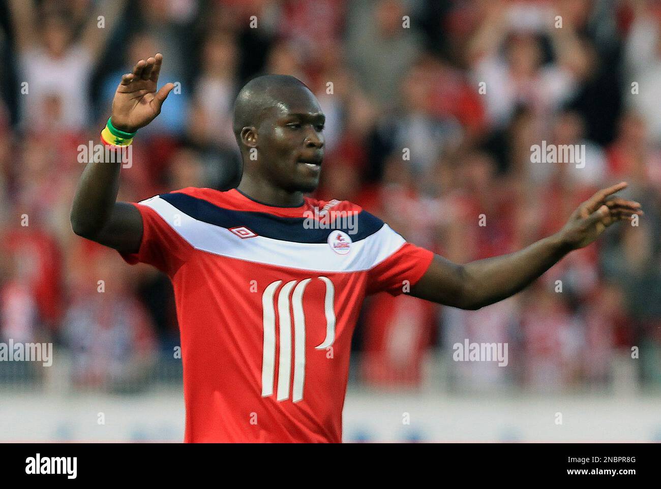 Lille's Moussa Sow reacts after scoring against Rennes during his ...