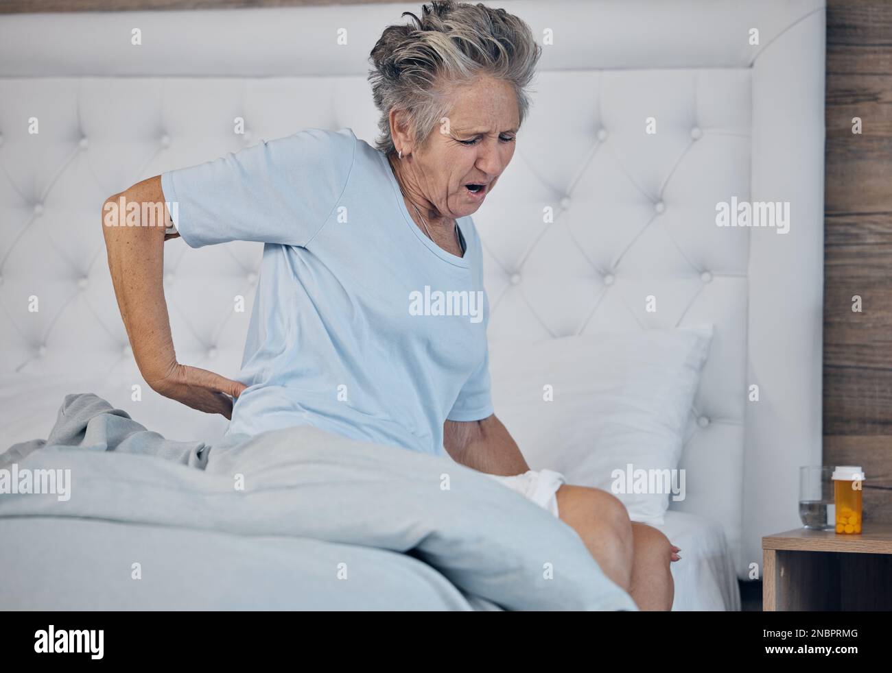 Back pain, elderly woman and health with injury and old age, medical ...