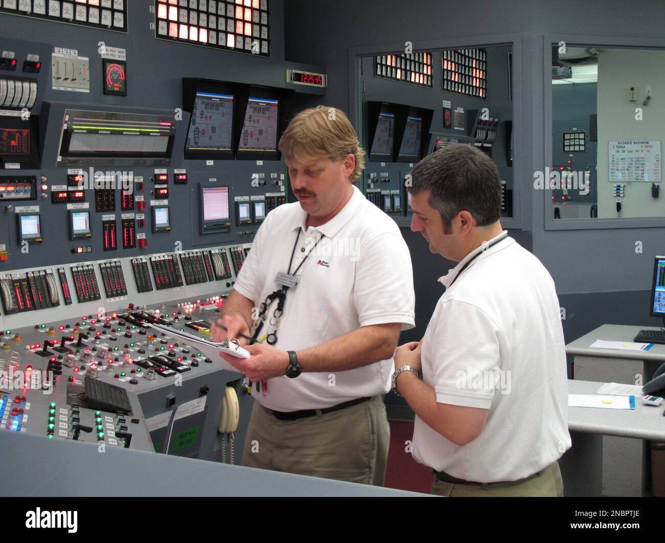 In this March 30, 2011 photo, nuclear reactor operators Chris Heinz ...