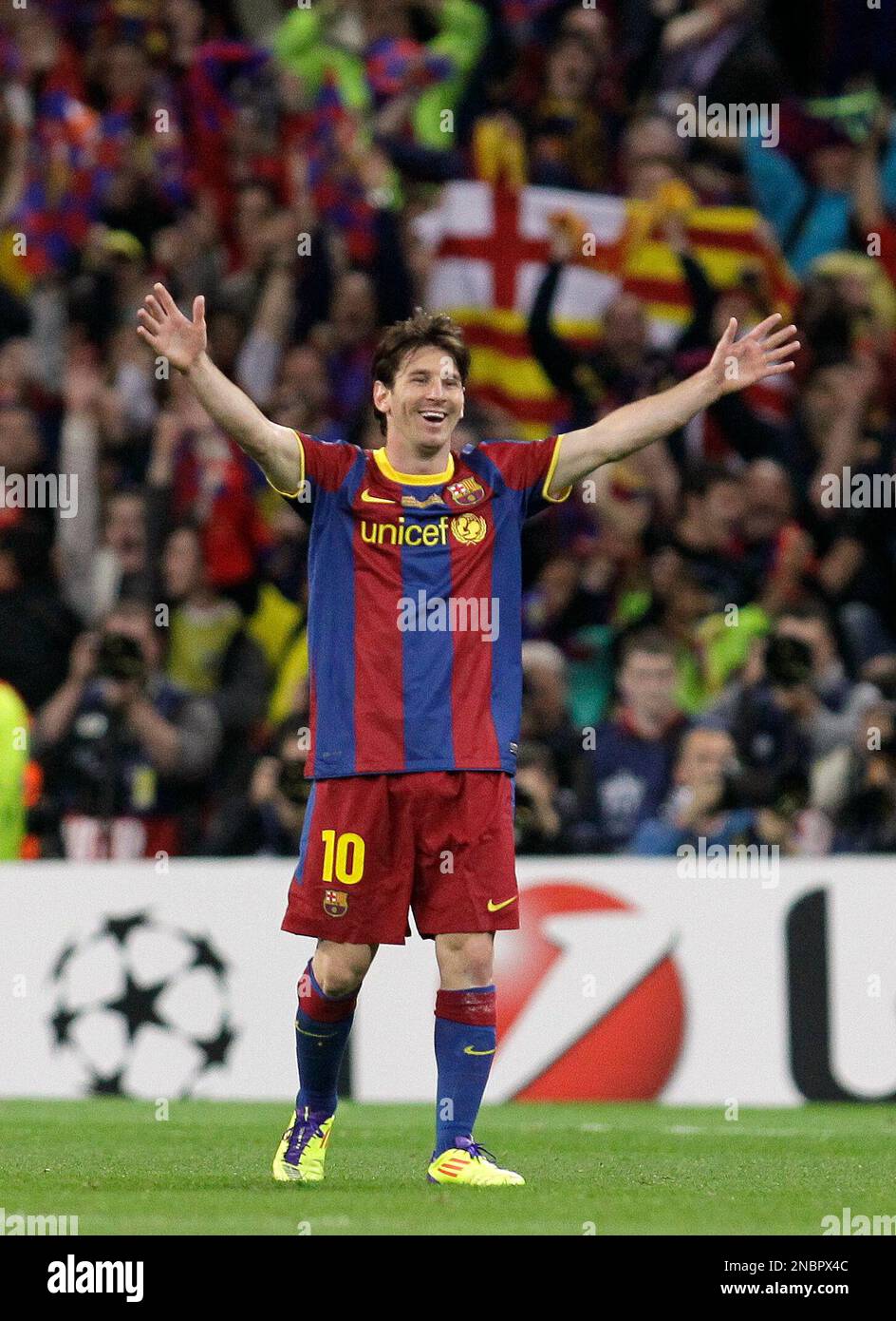 Barcelona's Lionel Messi celebrates winning the Champions League final ...