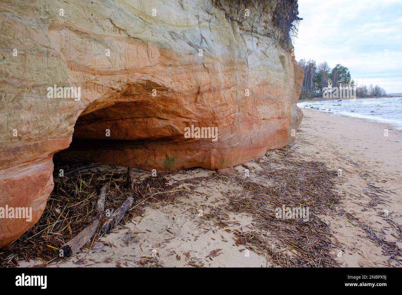 Beautiful in any weather, colorful sandstone cliffs. Beautiful coast of ...