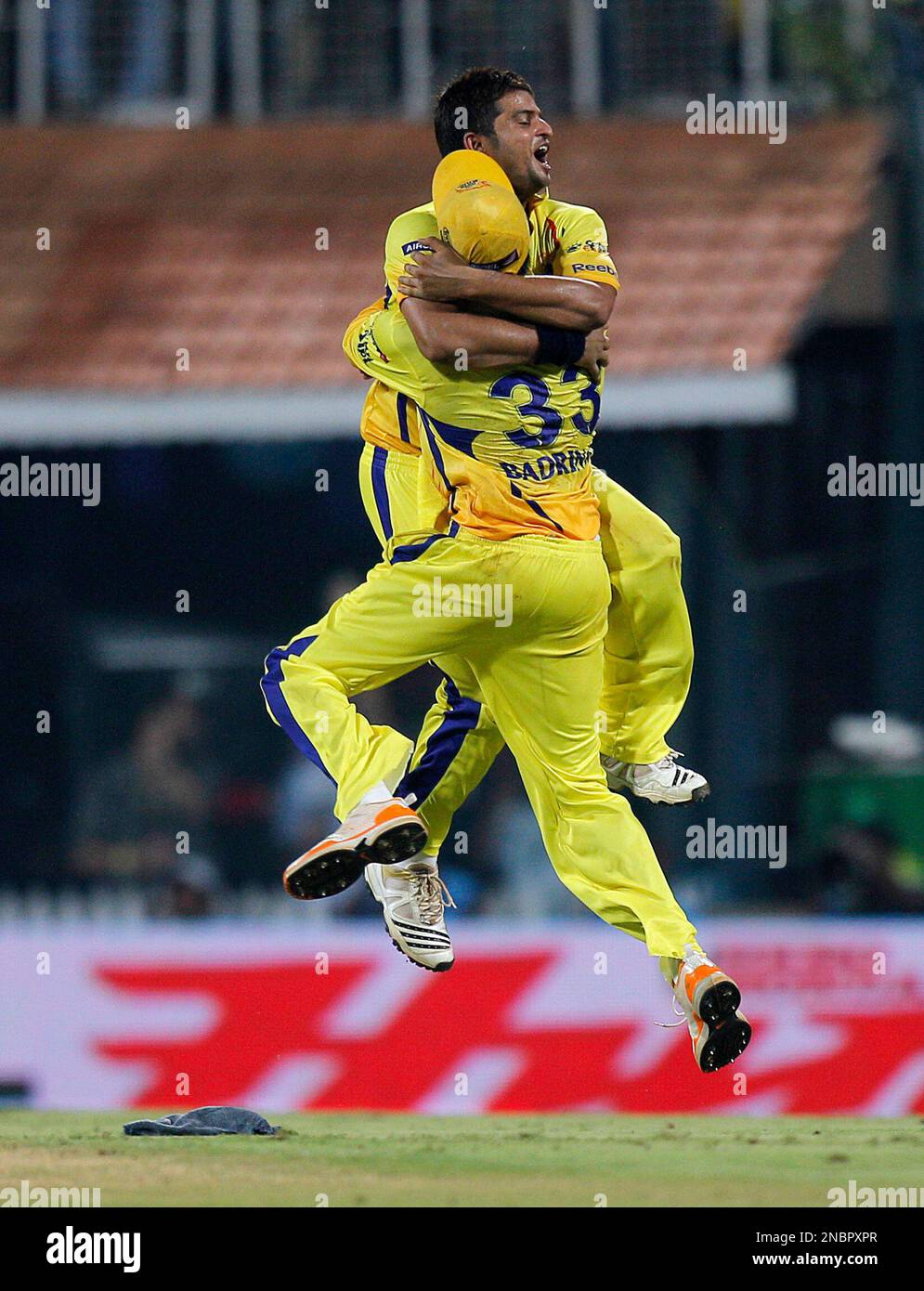 Suresh Raina of Chennai Super Kings, back, and teammate Subramanium ...