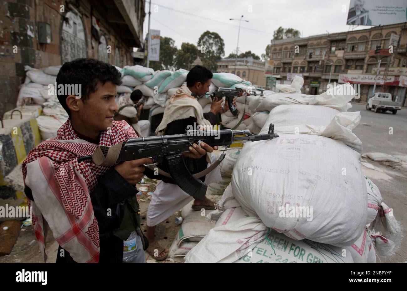 Armed tribesmen loyal to Sheik Sadeq al-Ahmar, the head of the powerful ...