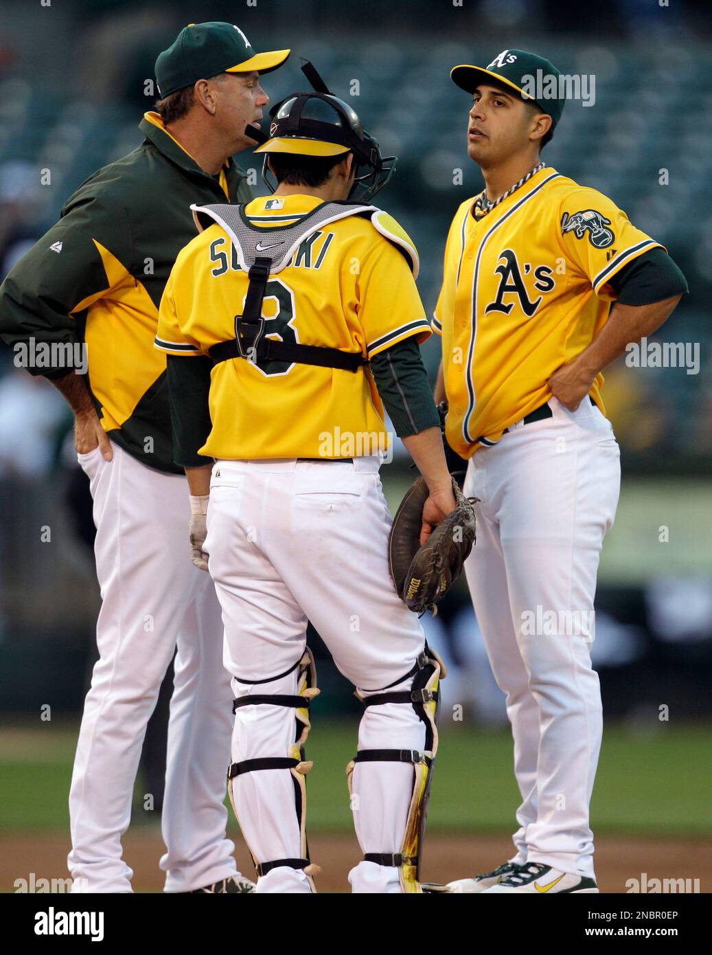 Oakland Athletics pitching coach Ron Romanick, left, and catcher Kurt ...