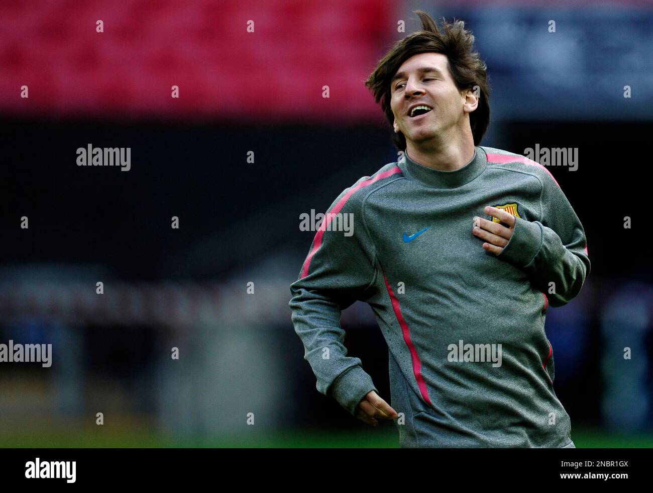 Barcelona's Lionel Messi reacts during their training session ahead of ...