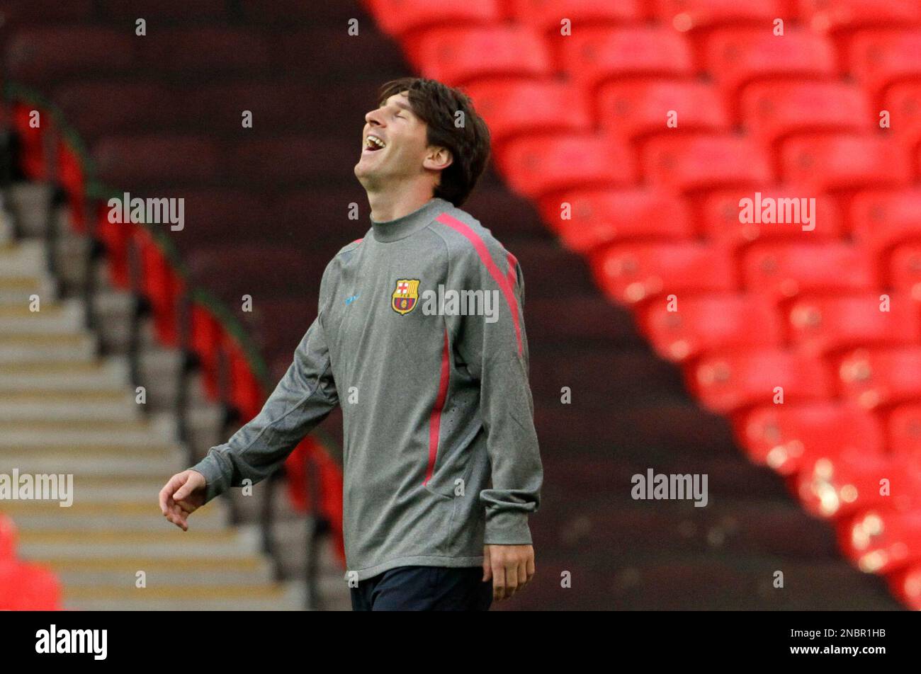 Barcelona's Lionel Messi reacts during their training session ahead of ...