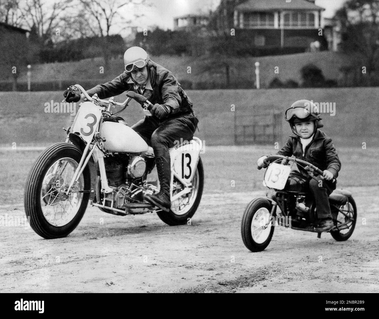 Race rider Ted Edwards and his five-year-old son, Teddy, side by side ...