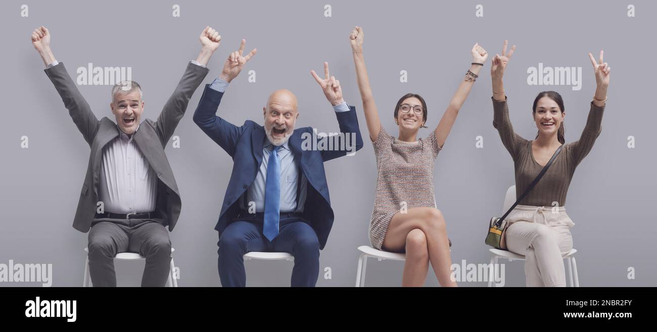 Happy business people celebrating together after the job interview ...