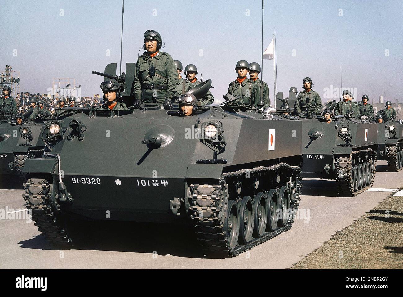 A column of Japan’s Grand Self-Defense Force’s Japanese-made tanks ...