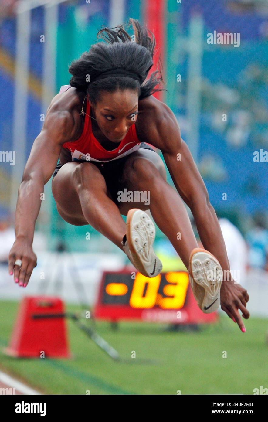 United States athlete Funmi Jimoh competes in the women's long jump ...