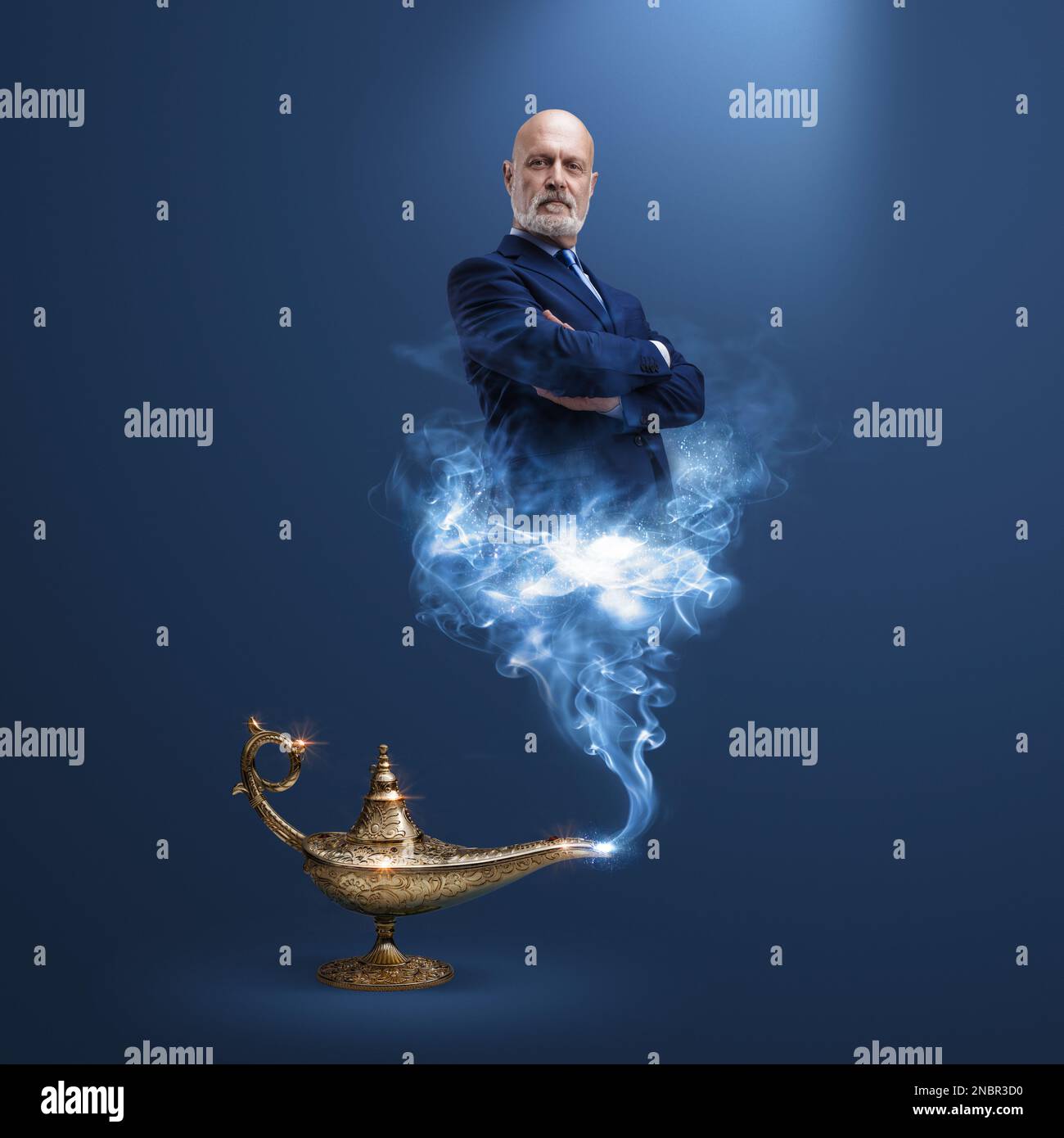 Corporate businessman genie coming out from a magic lamp, he is posing with crossed arms Stock ...